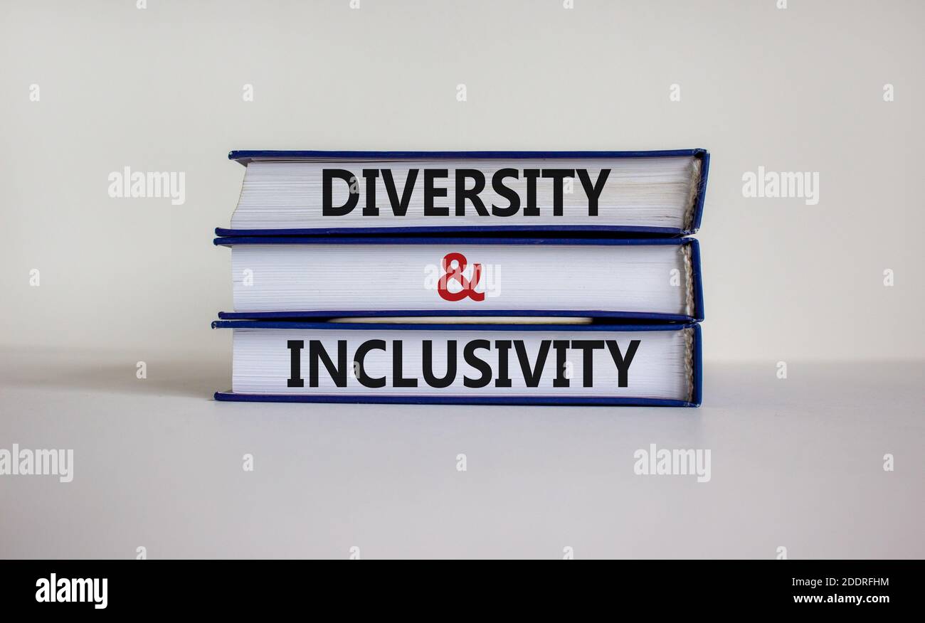 Books with words 'diversity and inclusivity' on beautiful white ...