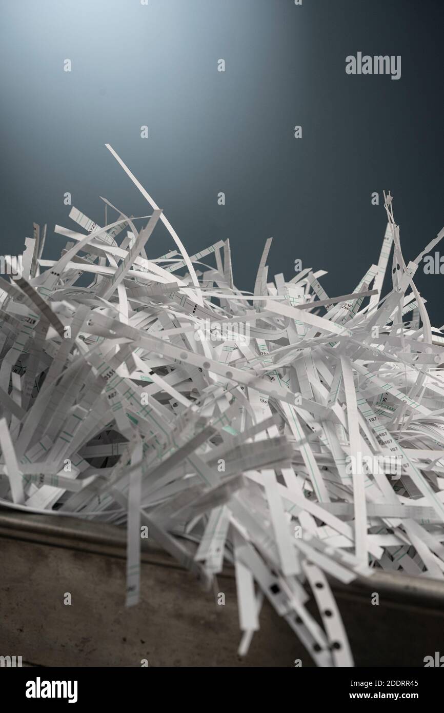 Close-up view with optical depth of white sheets of paper cut into ...