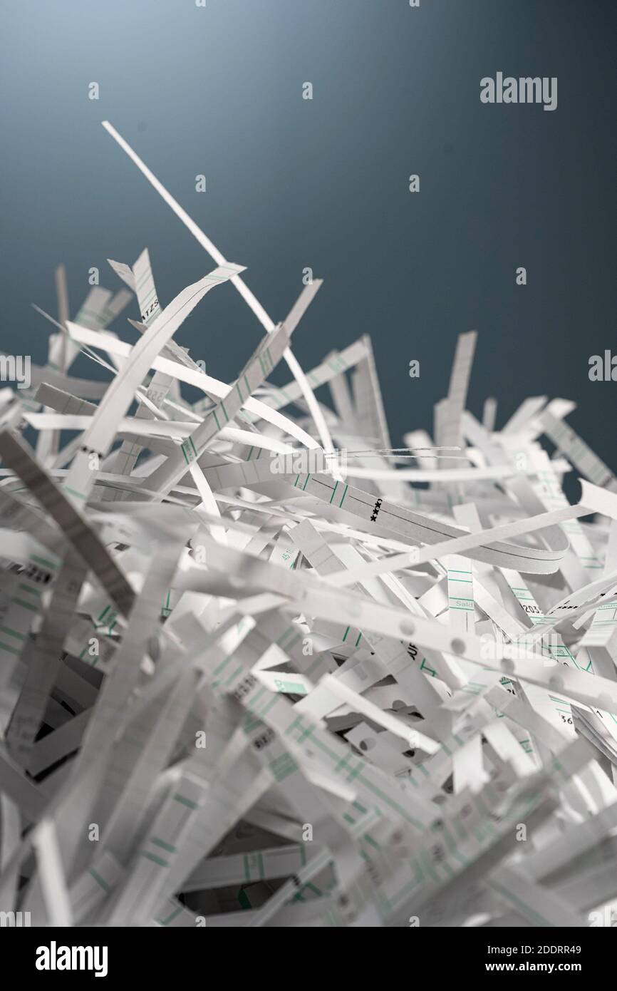 Close-up view with optical depth of white sheets of paper cut into ...