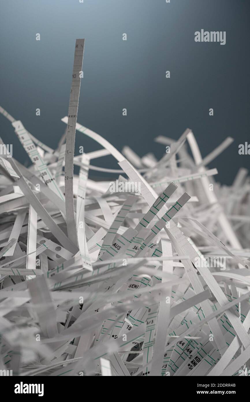 Close-up view with optical depth of white sheets of paper cut into ...