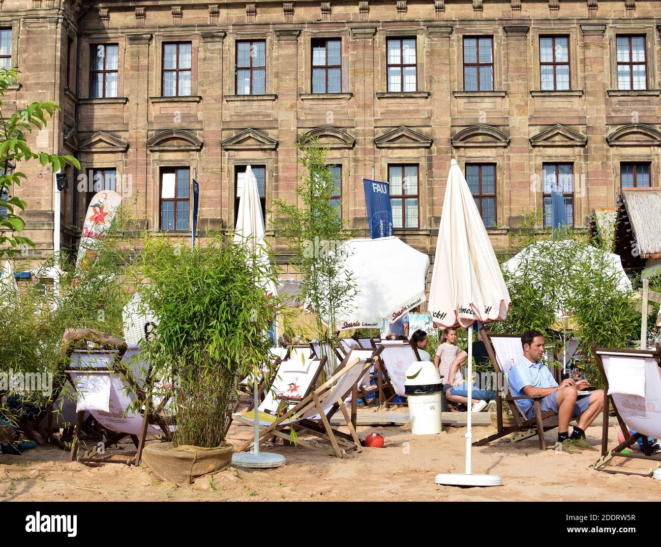 Terrace with sand in the middle of the town Stock Photo - Alamy