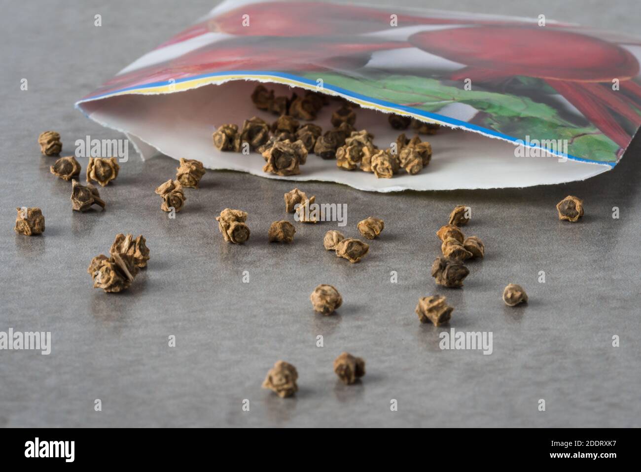 Beet Seeds Spilled from a Seed Packet Stock Photo - Alamy