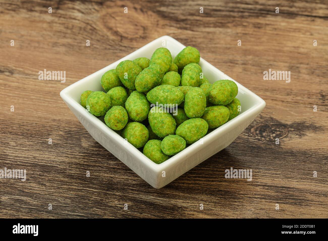 Spicy wasabi peanuts snack in the bowl Stock Photo - Alamy