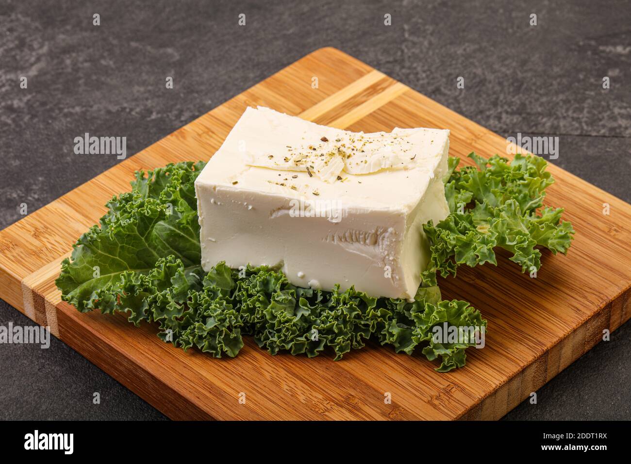 Traditional tasty Greek Feta soft cheese brick Stock Photo - Alamy