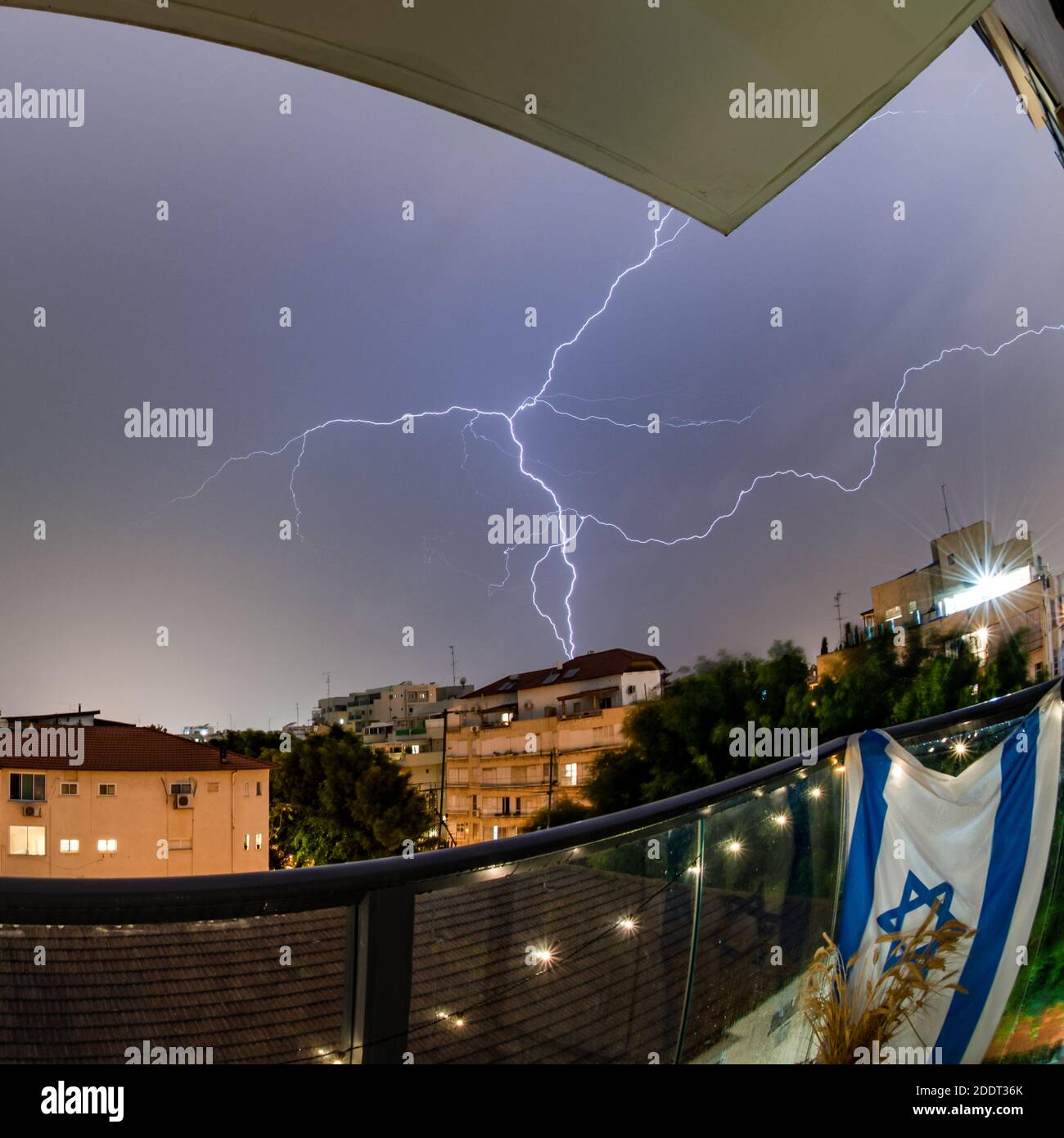 Isolated Israeli Flag with a winter thunderstorm extreme weather in ...