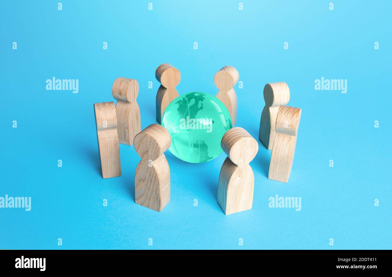 Circle of people surrounds the planet earth globe. Global world ...
