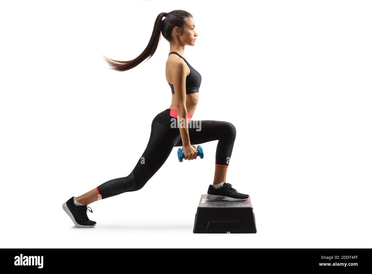 Young woman exercising step aerobic with small weights isolated on ...