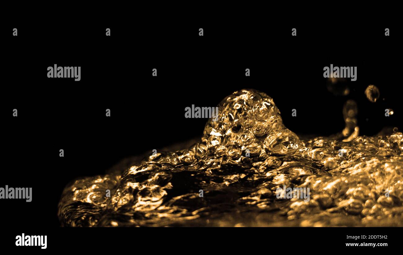 Hi speed close up images of oil liquid from diesel gasoline splashing ...