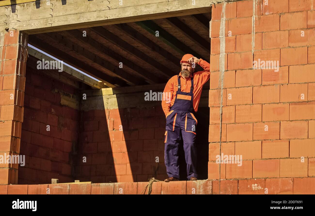 Daily routine at construction. Well done. Repairman tired builder ...