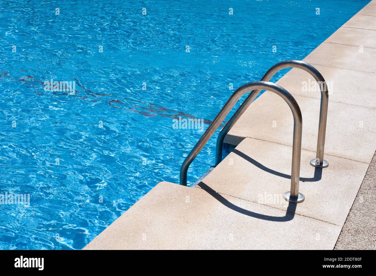 calm pool blue water stair curb summer calm Stock Photo - Alamy
