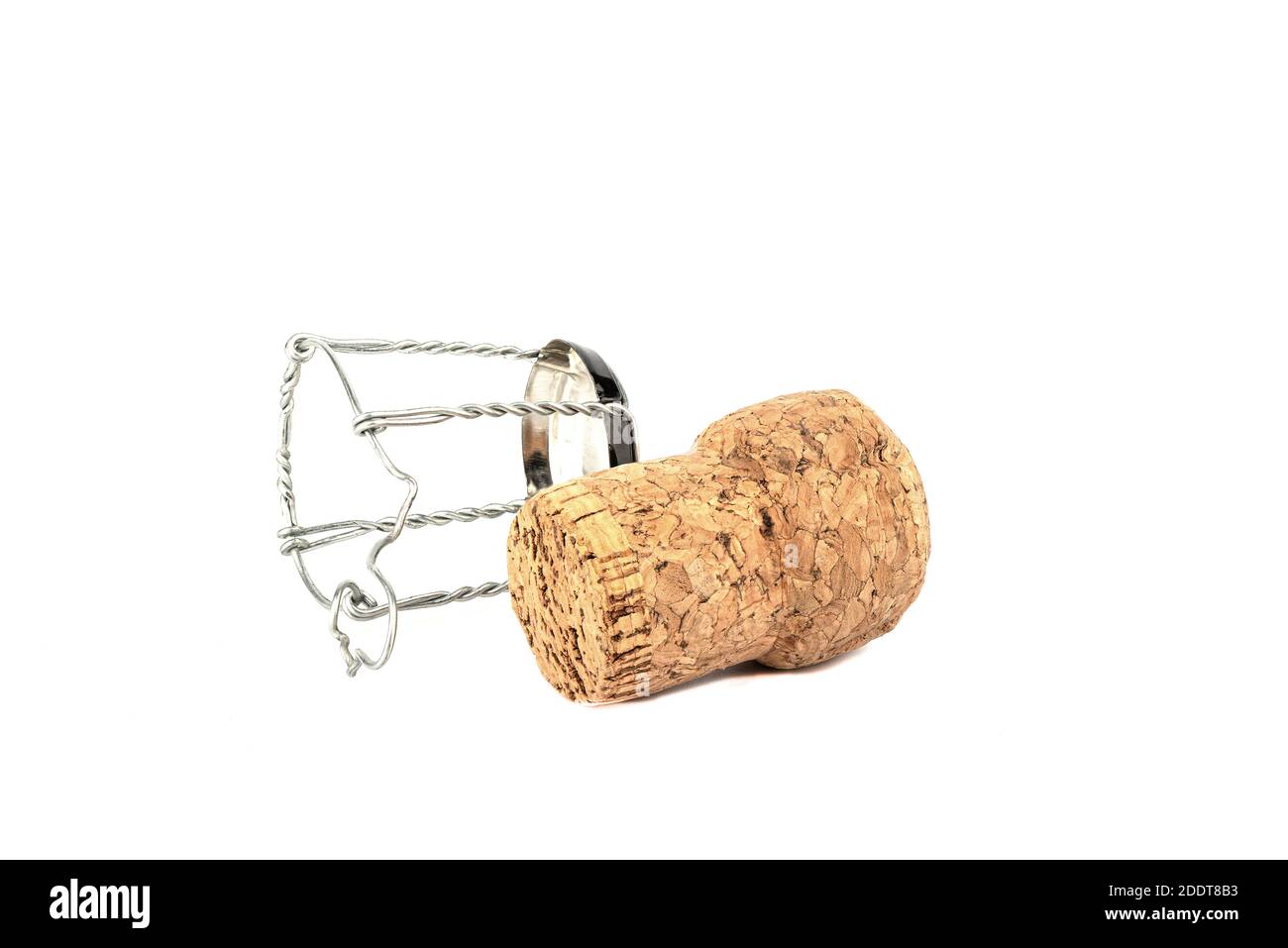 Champagne cork and muselet separately on a white background. Close up ...