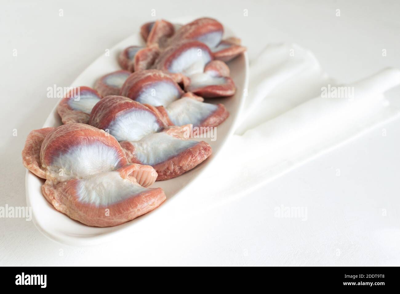 Raw chicken stomach, turkey offal. uncooked guts of poultry. Isolate ...