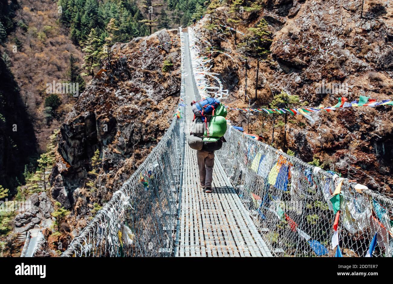 Carrying heavy load on his back hi-res stock photography and images - Alamy