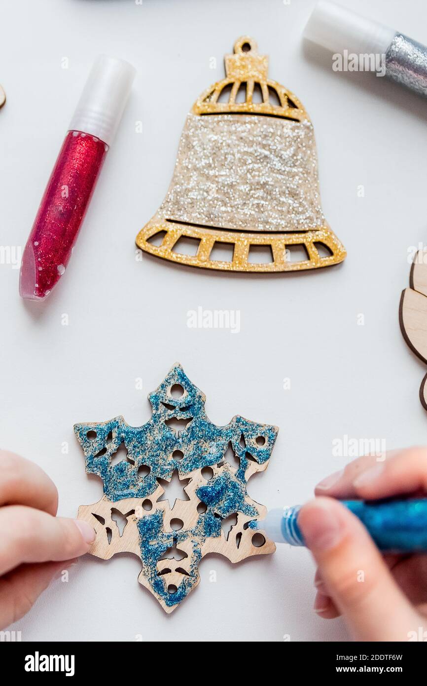 Making handmade Christmas decorations.Kids making decor for Christmas ...