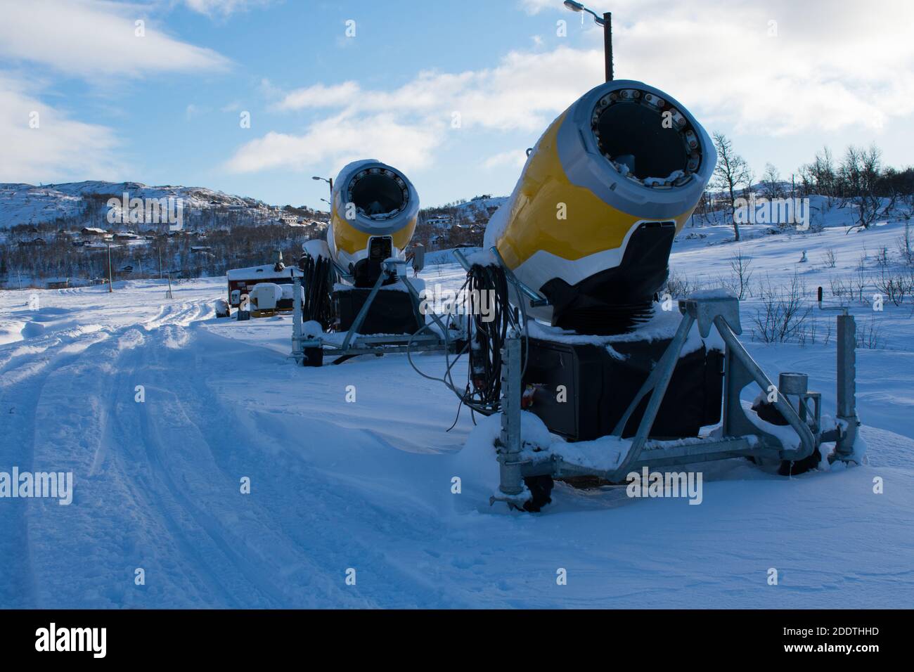 Snow Making Machine With Cabins in back ground. Snow Cannons Stock ...