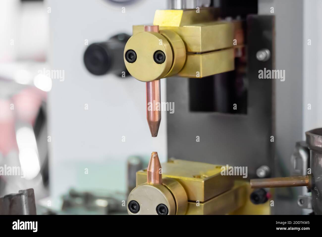 Copper electrodes of spot welding machine at factory, plant - close up ... Copper electrodes of spot welding machine at factory, plant - close up ...