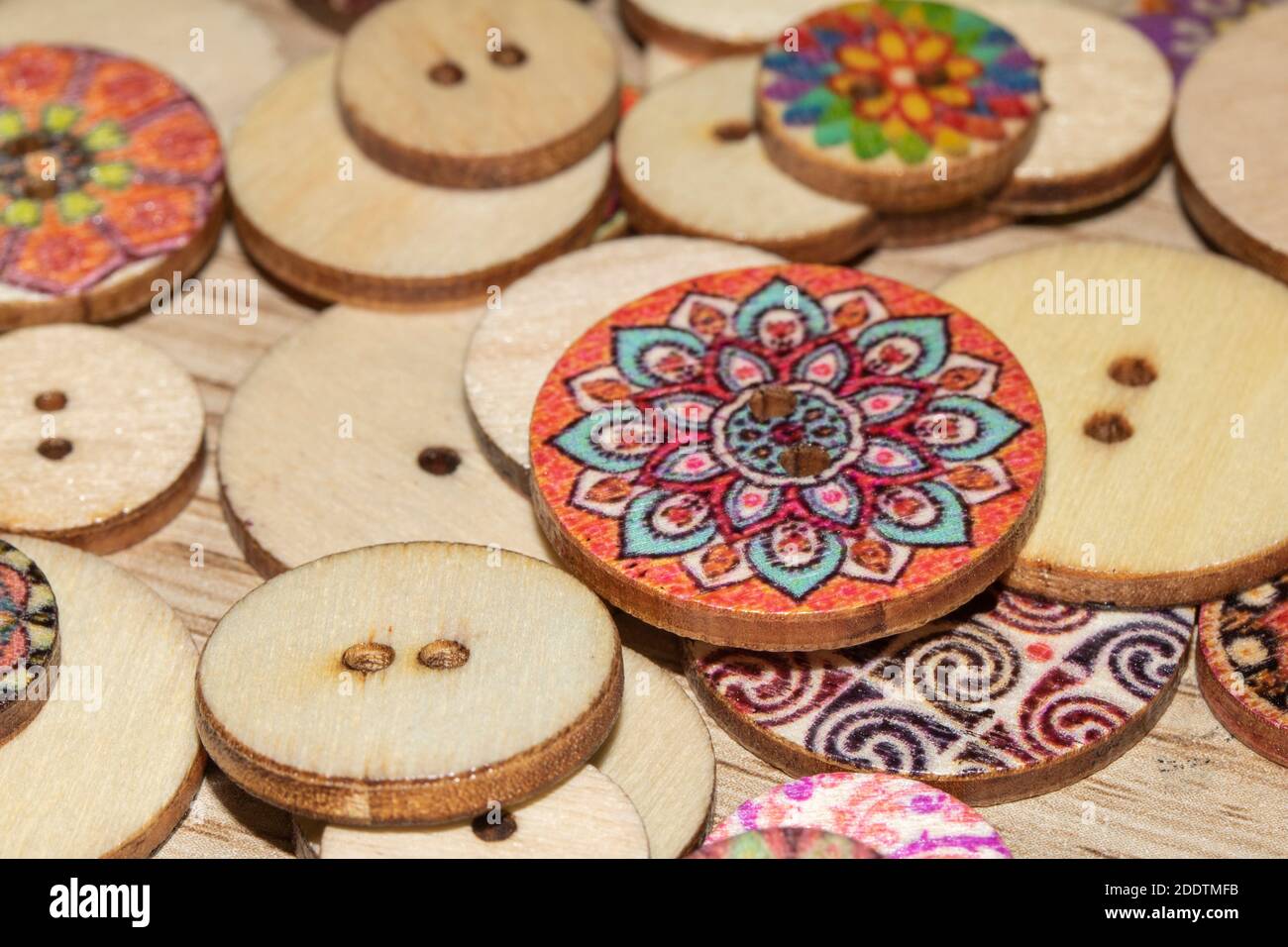 Cute Coloured Buttons on a Desk Close Up Stock Photo - Alamy