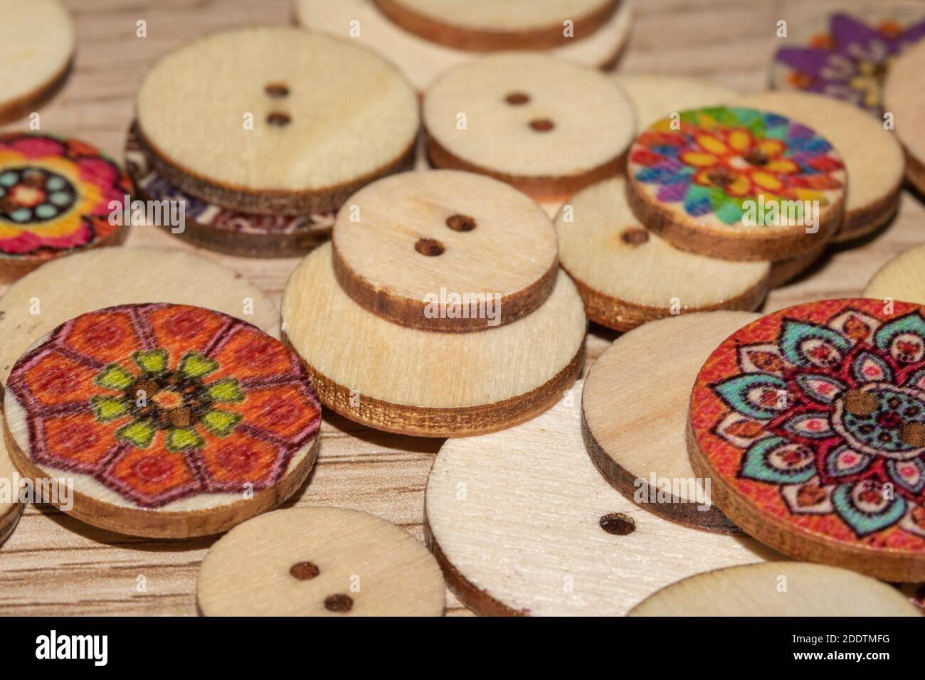 Cute Coloured Buttons on a Desk Close Up Stock Photo - Alamy