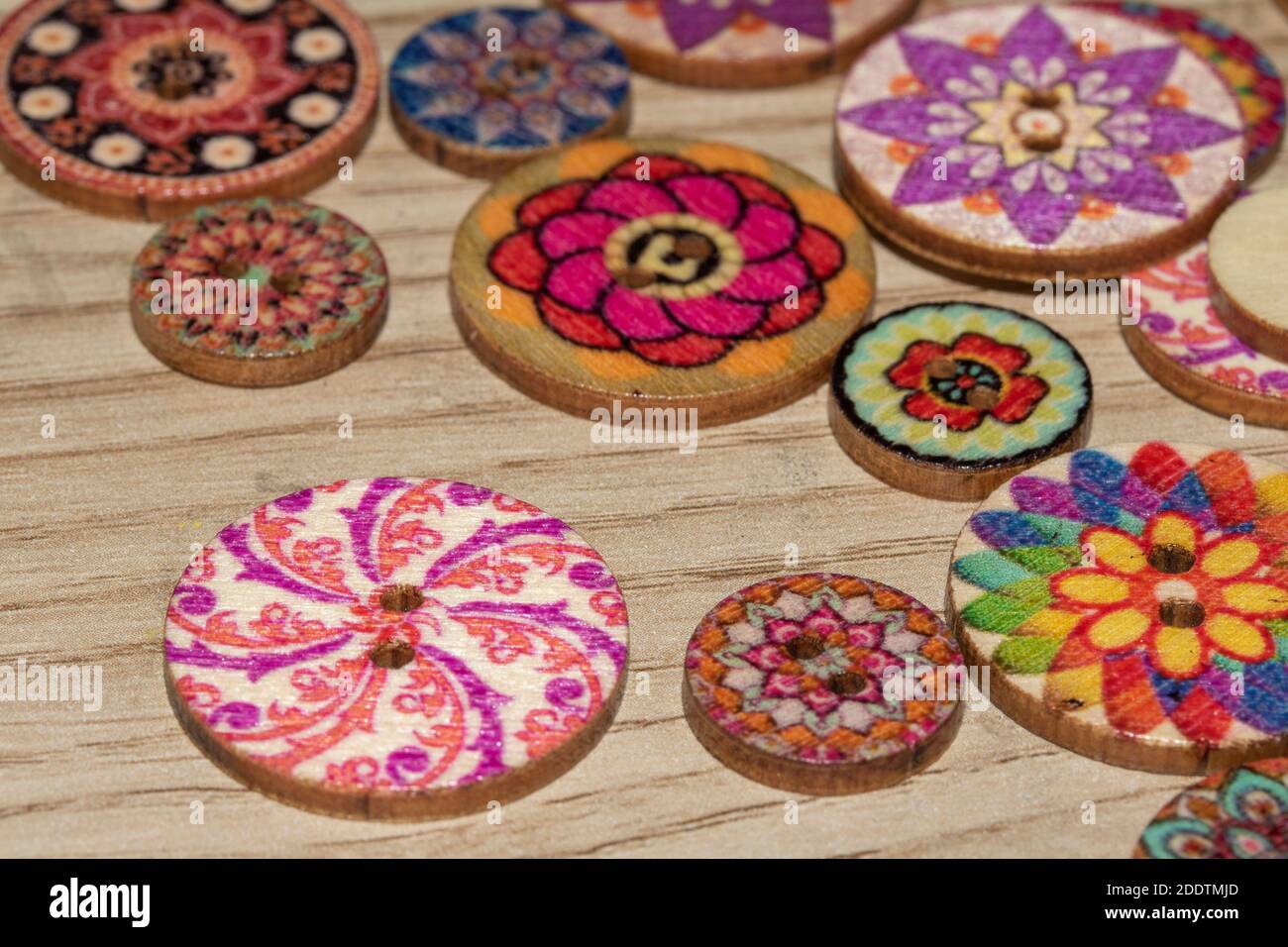 Cute Coloured Buttons on a Desk Close Up Stock Photo - Alamy