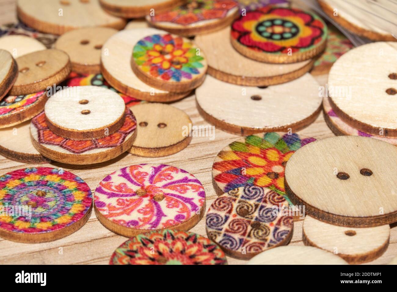 Cute Coloured Buttons on a Desk Close Up Stock Photo - Alamy