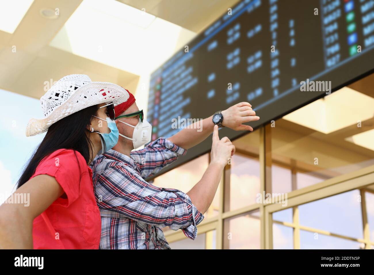 Couple check information board hi-res stock photography and images - Alamy