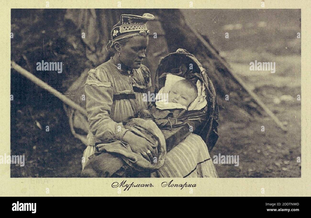 Kola Sami women and a child Stock Photo - Alamy