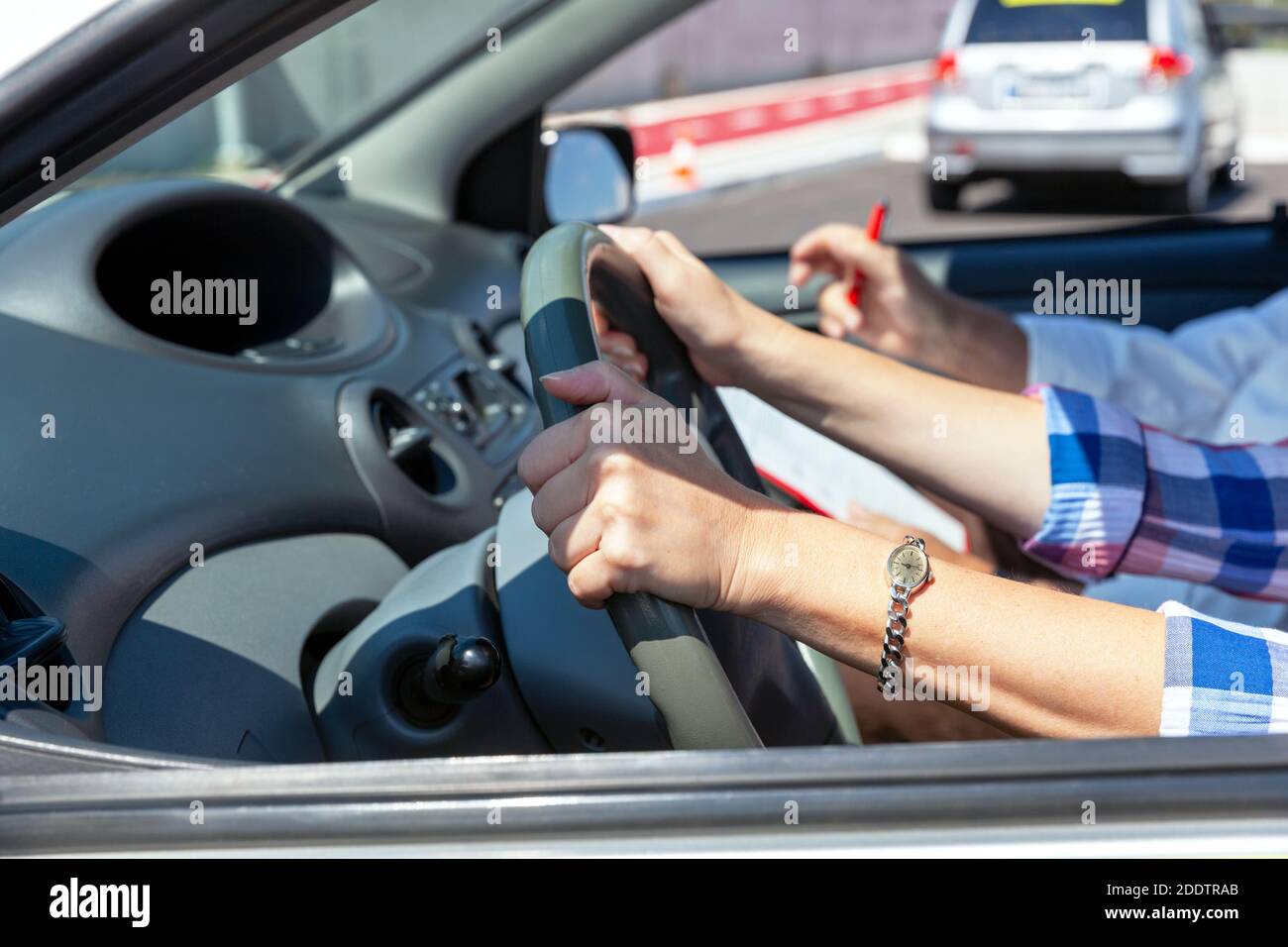 Learner driver student driving a car with instructor Stock Photo - Alamy
