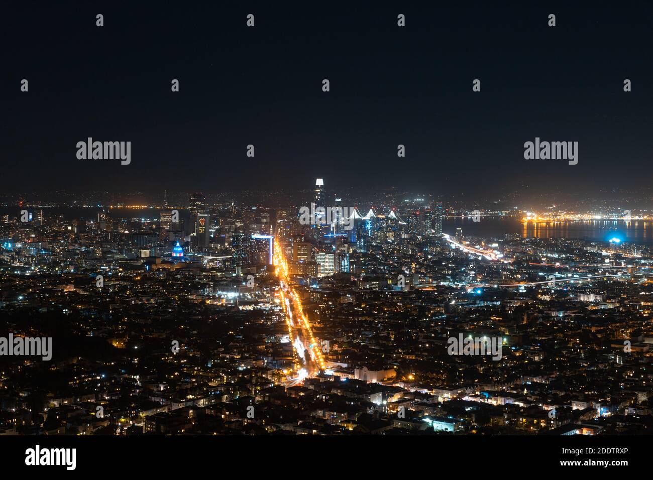 An aerial view shot of the beautiful illuminated modern city at night ...