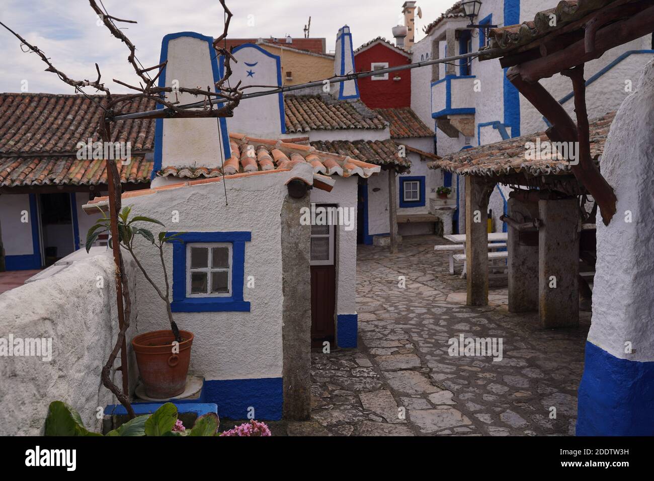 Old traditional white-washed buildings with tiled roofs Stock Photo - Alamy