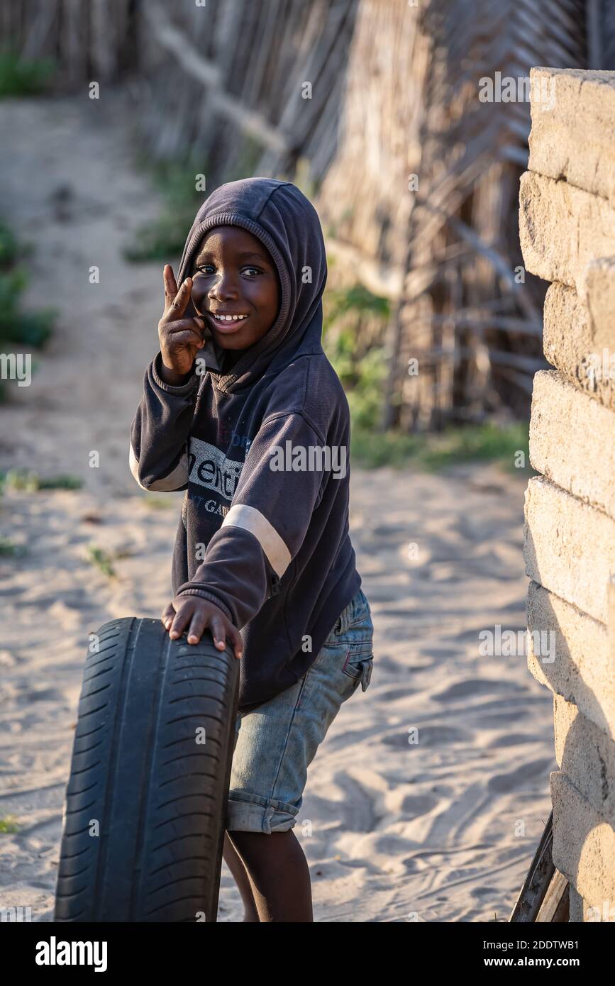 Ghana boy posing with his car tire in a small village in Ghana called ...