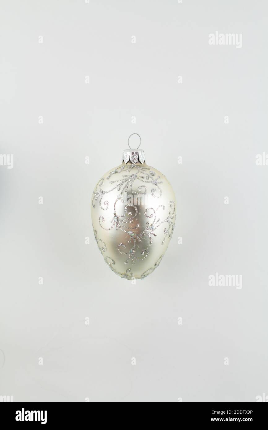 silver ball for the Christmas tree on white background Stock Photo - Alamy