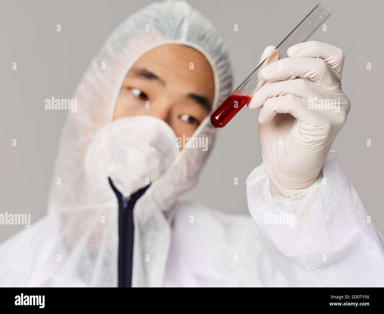 Male laboratory assistant blood test research treatment Stock Photo - Alamy
