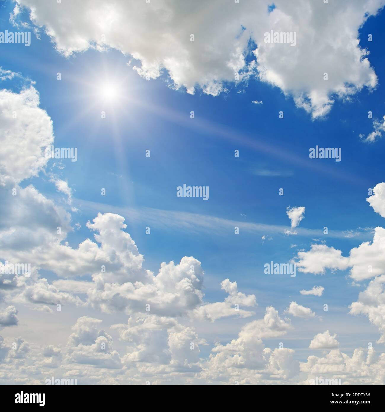 sun in blue sky Stock Photo - Alamy