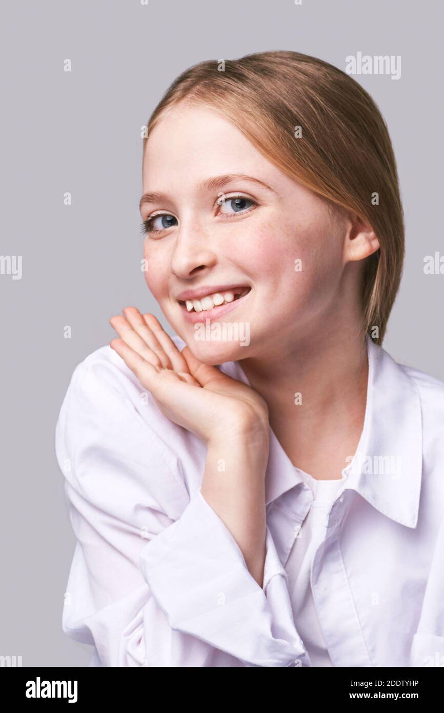 Beauty girl portrait. Young woman. Hand near nead. Face massage concept ...