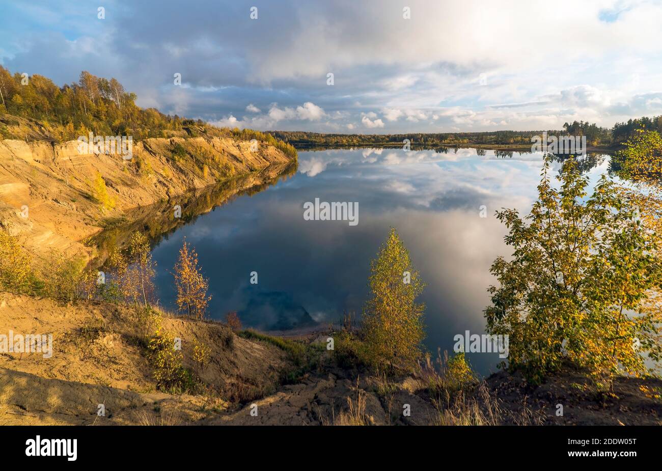 The sandy shore of a mountain lake in the fall .Leningrad region Stock ...