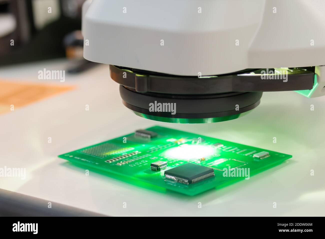 Printed circuit board under industrial microscope - quality control concept Stock Photo - Alamy