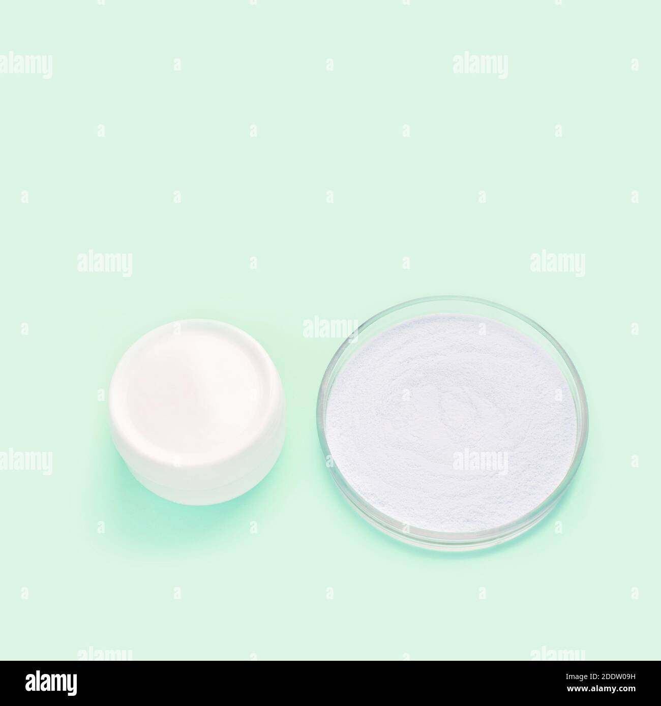 Collagen white powder. Pastel color background. Health product Stock ...