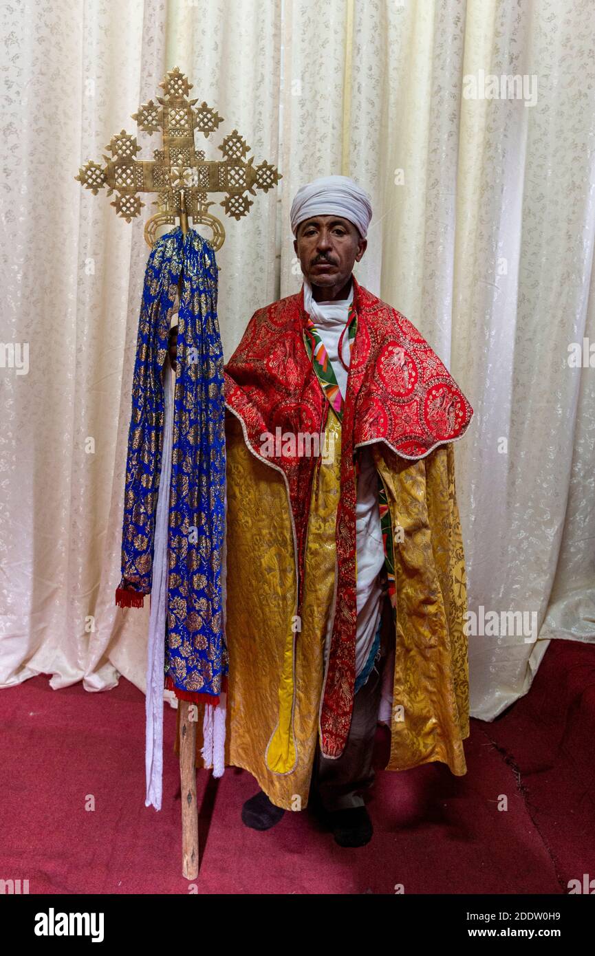 Ethiopian orthodox priest in an old rural church in Northern Ethiopia ...