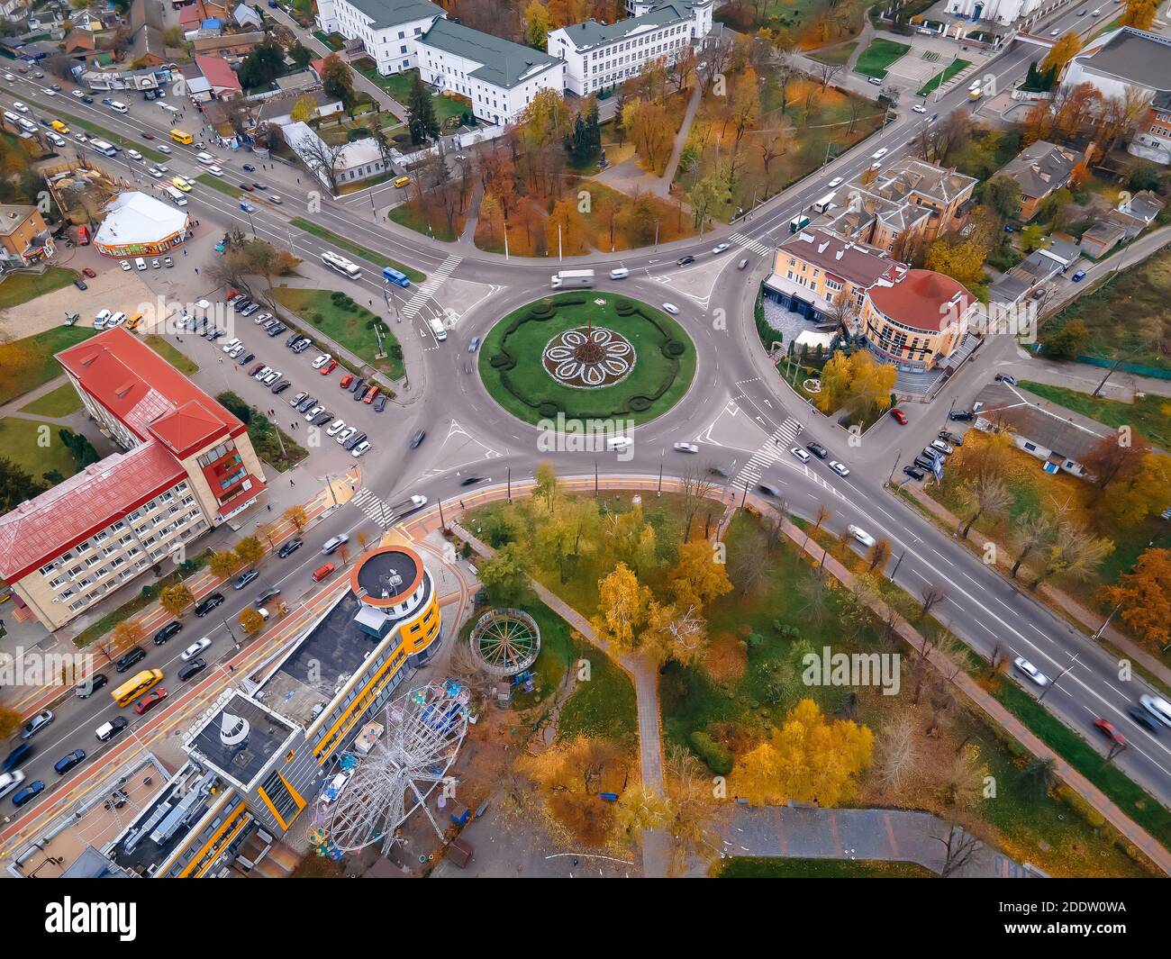 Aerial view of roundabout road with circular cars in small european ...