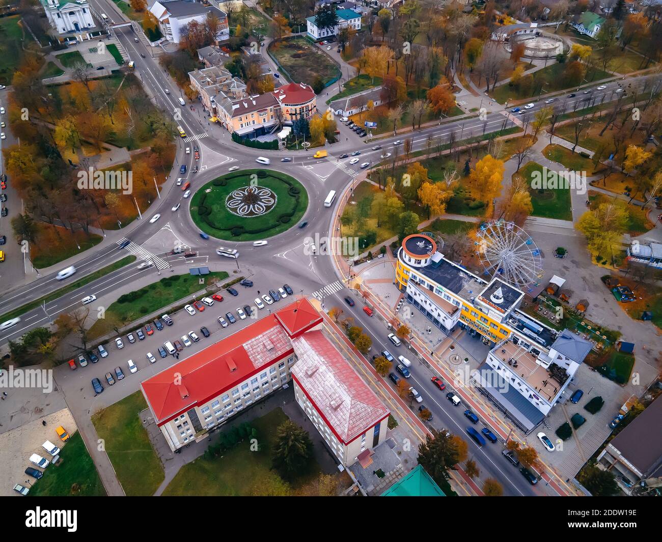 Aerial view of roundabout road with circular cars in small european ...