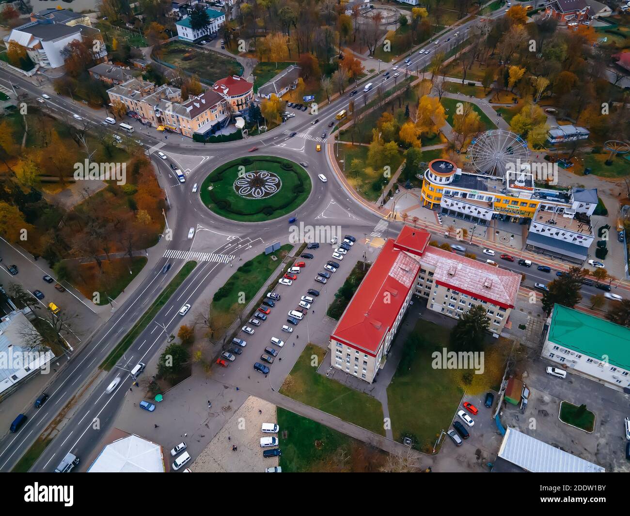 Aerial view of roundabout road with circular cars in small european ...