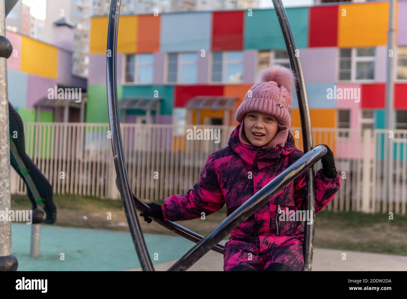 Playground, a child plays on a spinning pipe, in the entertainment ...