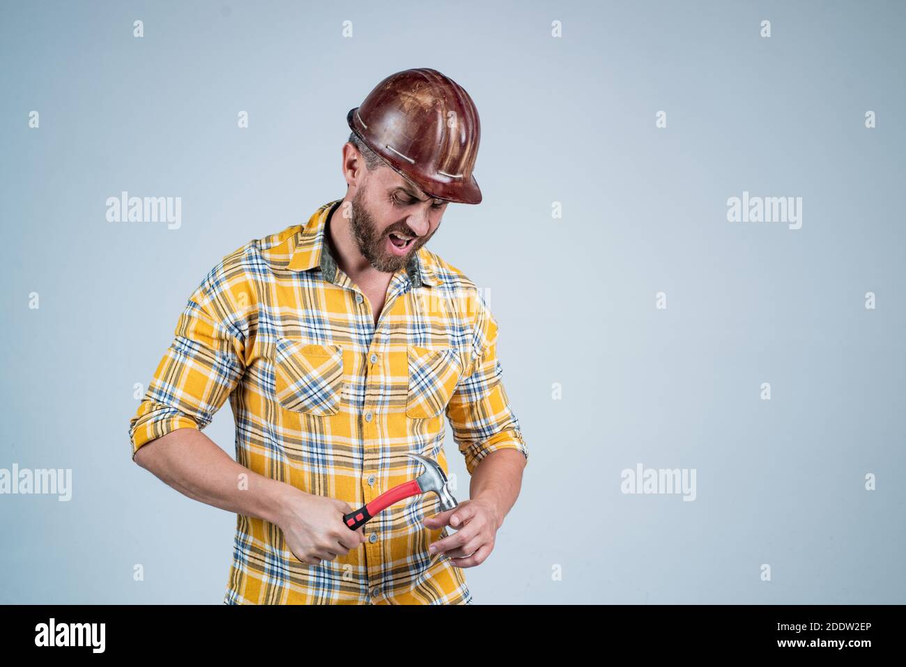 mature builder in shirt. unshaven man on construction site. building ...