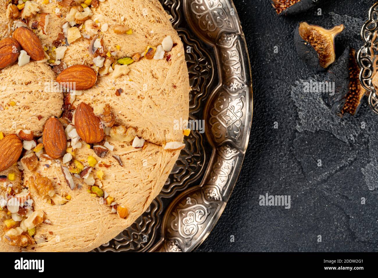 Close up photo of halva dessert on silver plate Stock Photo - Alamy