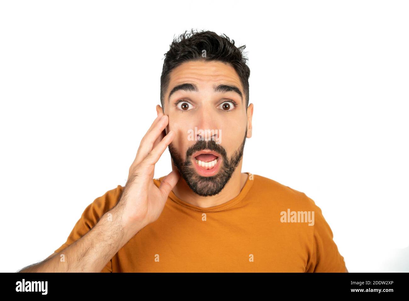 Young beautiful woman with shocked expression Stock Photo - Alamy