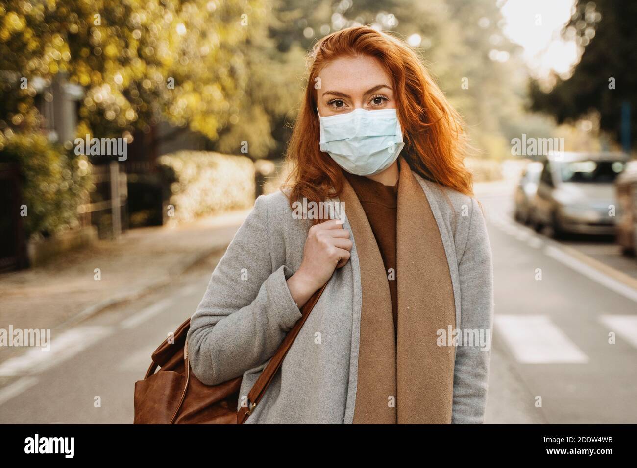 Young girl portrait in urban street wearing face mask Stock Photo - Alamy