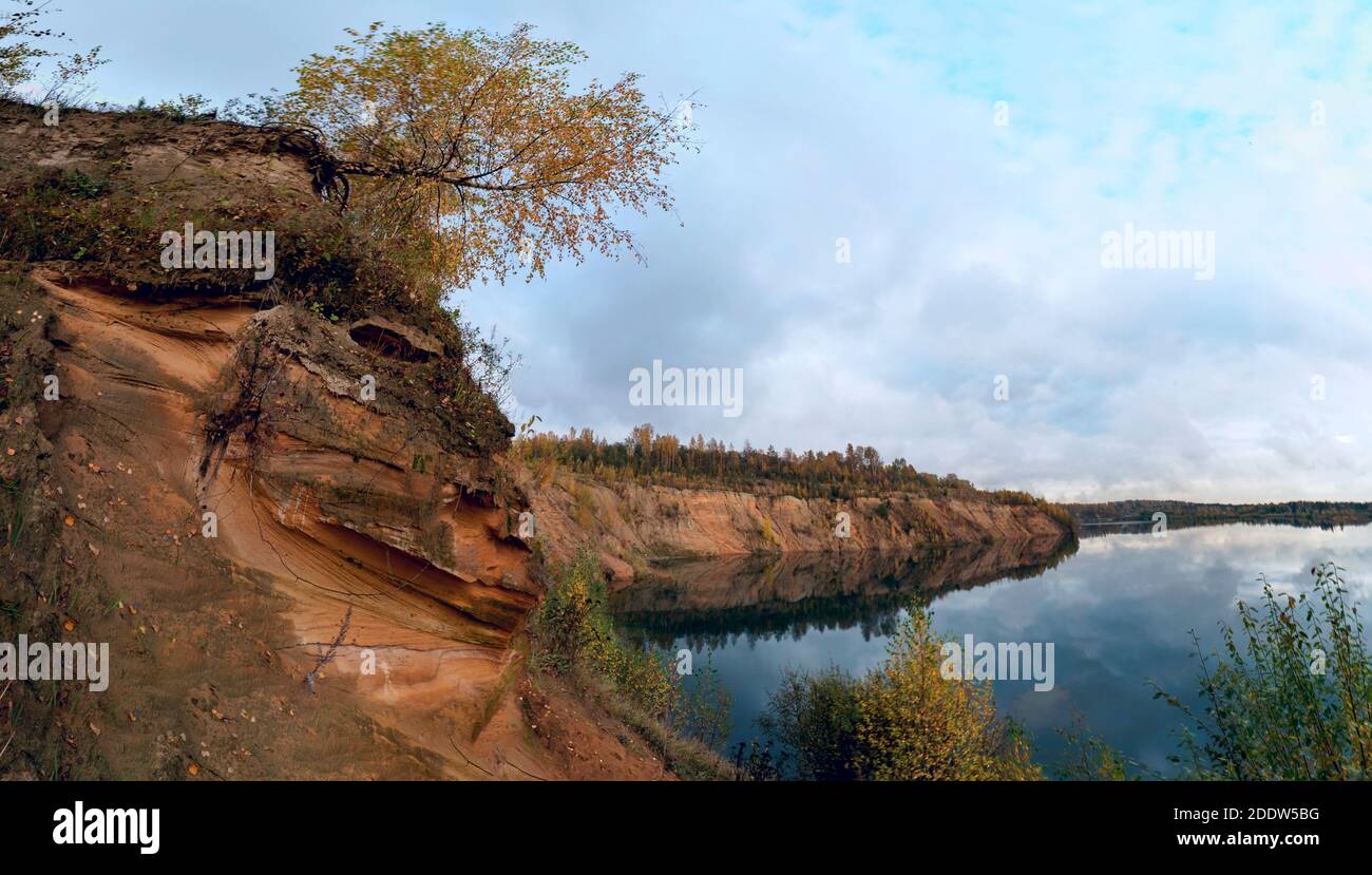 The sandy shore of a mountain lake in the fall .Leningrad region Stock ...