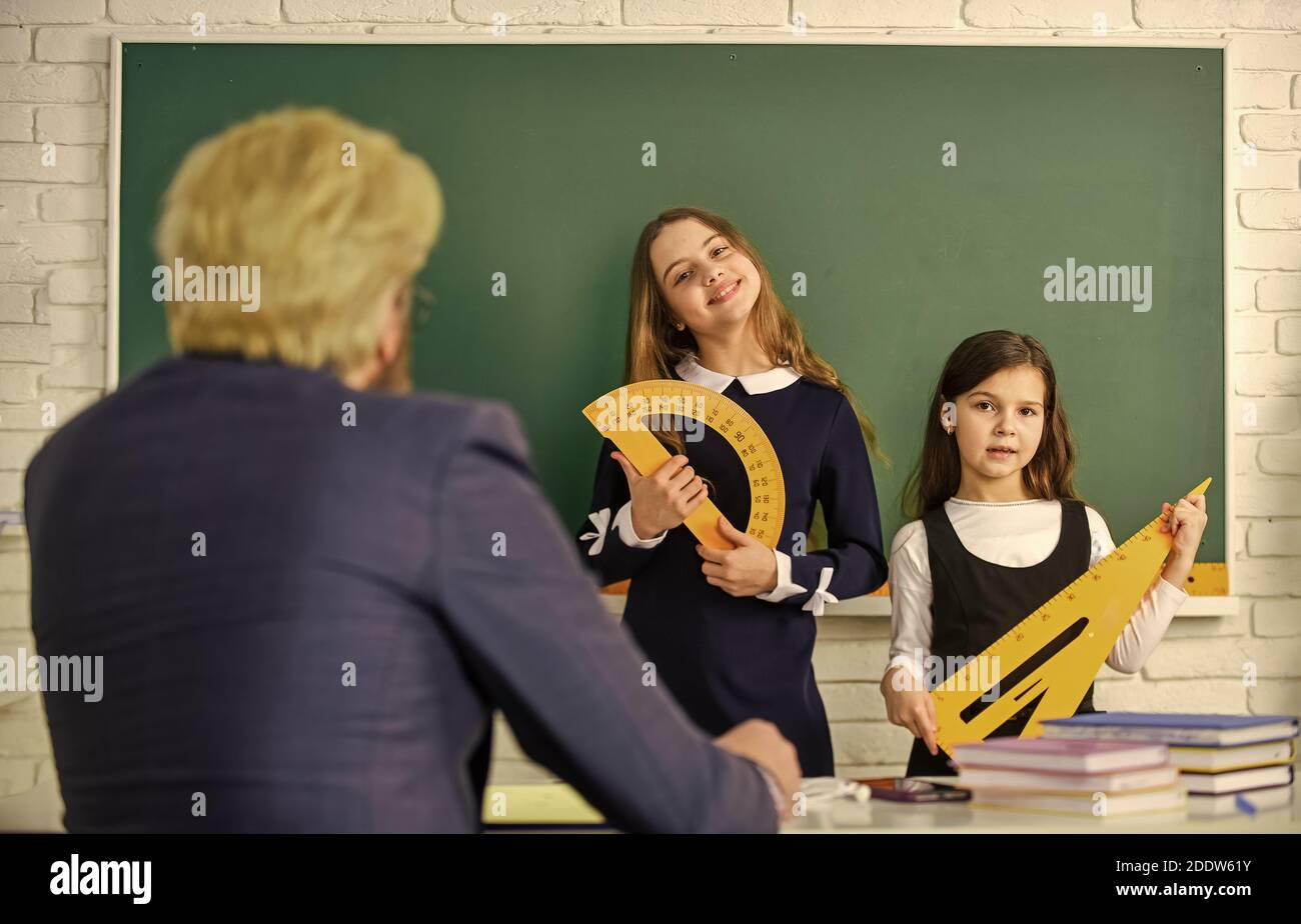 Study together. Teacher and kids Classroom. Discussion group of ...