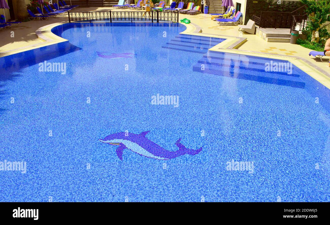 Swimming pool in the Diogenis Blue Palace hotel Stock Photo - Alamy