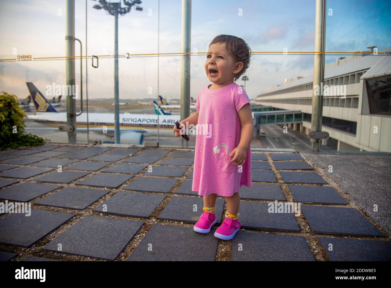 Baby crying on plane hi-res stock photography and images - Alamy
